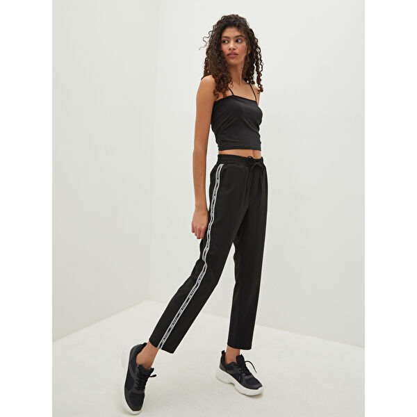 LCW CASUAL Beli Lastikli Şerit Slogan Baskılı Dar Paça Kadın Pantolon