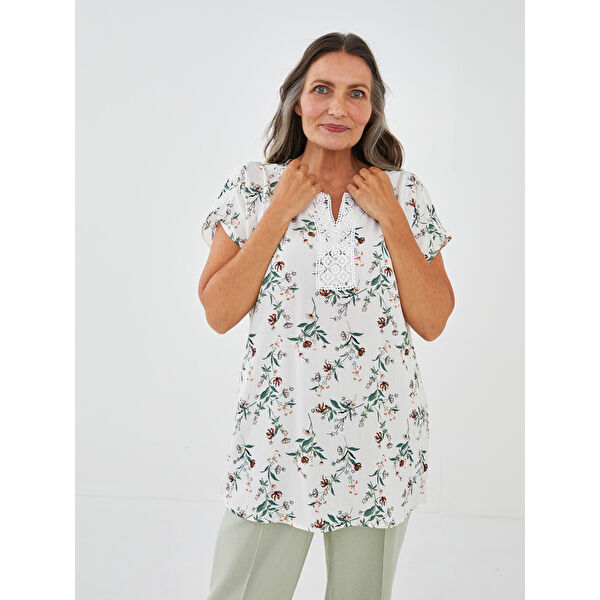 LCW GRACE Kaçık Yaka Çiçekli Kısa Kollu Krinkle Kumaş Kadın Bluz LCW GRACE Kaçık Yaka Çiçekli Kısa Kollu Krinkle Kumaş Kadın Bluz