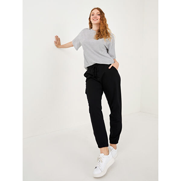 Büyük Beden Beli Lastikli Düz Cep Detaylı Kadın Jogger Eşofman Altı Büyük Beden Beli Lastikli Düz Cep Detaylı Kadın Jogger Eşofman Altı