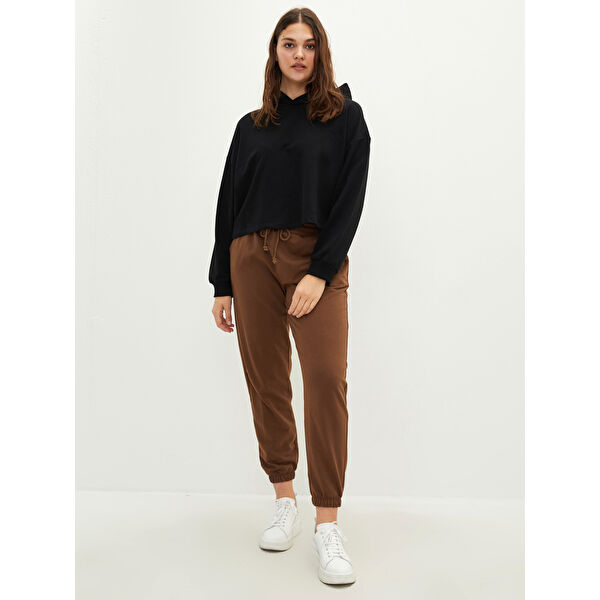 Büyük Beden Beli Lastikli Cep Detaylı Kadın Jogger Eşofman Altı Büyük Beden Beli Lastikli Cep Detaylı Kadın Jogger Eşofman Altı