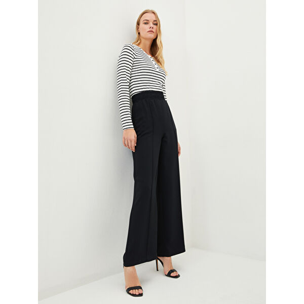 Beli Lastikli Standart Fit Düz Cep Detaylı Kadın Pantolon Beli Lastikli Standart Fit Düz Cep Detaylı Kadın Pantolon