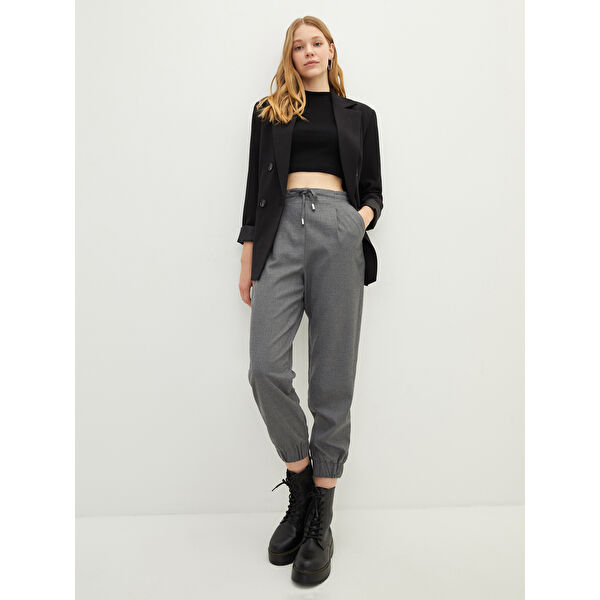 Beli Lastikli Düz Cep Detaylı Kadın Jogger Pantolon Beli Lastikli Düz Cep Detaylı Kadın Jogger Pantolon