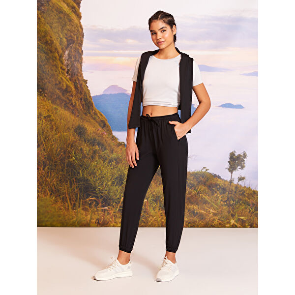 Beli Lastikli Düz Cep Detaylı Kadın Outdoor Jogger Pantolon Beli Lastikli Düz Cep Detaylı Kadın Outdoor Jogger Pantolon