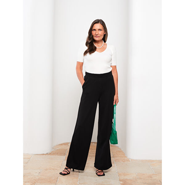 Beli Lastikli Standart Fit Düz Kadın Pantolon Beli Lastikli Standart Fit Düz Kadın Pantolon