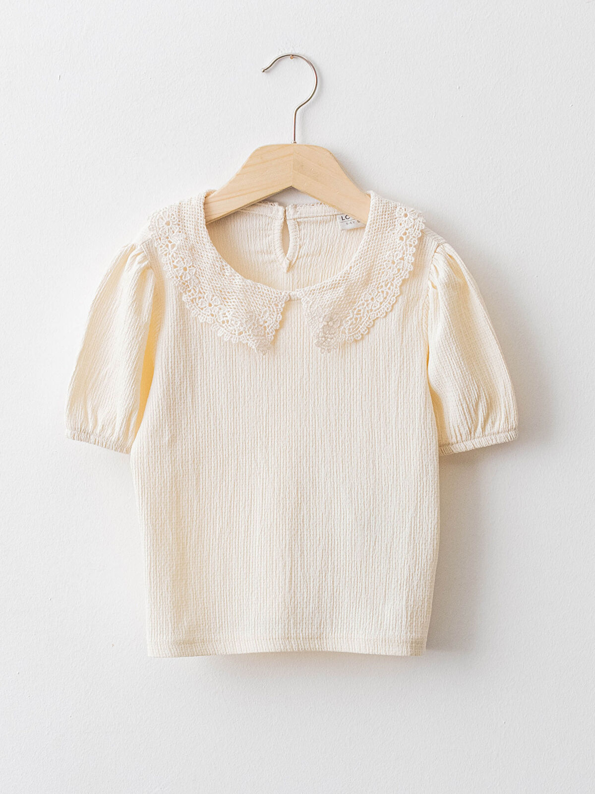 Dantel Detaylı Bebe Yaka Kısa Kollu Kız Çocuk Bluz Dantel Detaylı Bebe Yaka Kısa Kollu Kız Çocuk Bluz