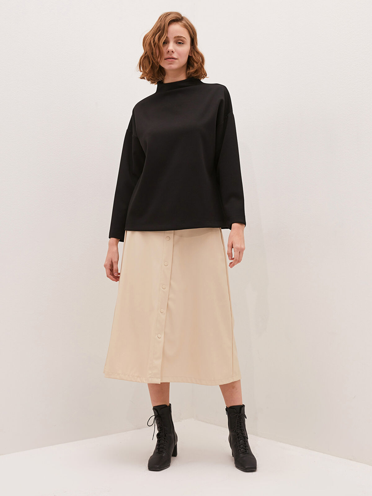 Beli Lastikli Deri Görünümlü Uzun Kloş Etek