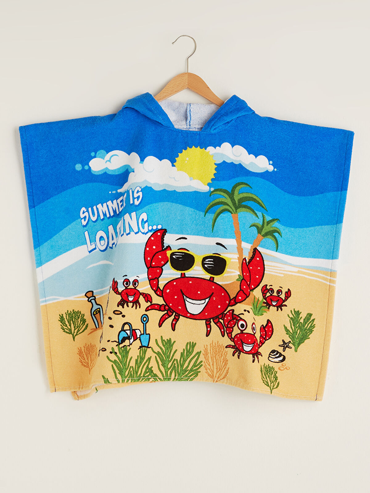 Erkek Çocuk Kapüşonlu Baskılı Panço Plaj Havlusu Erkek Çocuk Kapüşonlu Baskılı Panço Plaj Havlusu