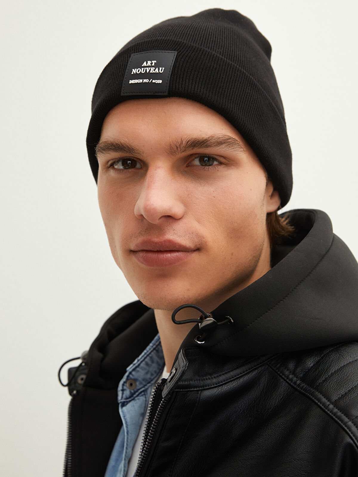 Etiket Detaylı Erkek Triko Bere