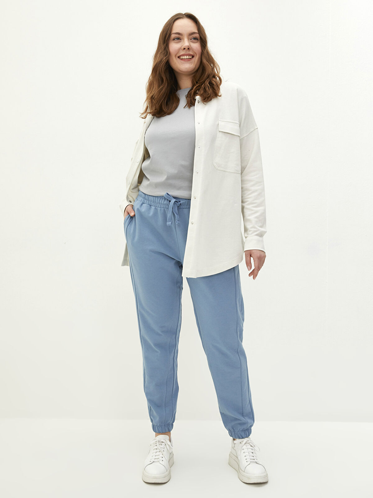 Büyük Beden Beli Lastikli Düz Cep Detaylı Kadın Jogger Eşofman Altı Büyük Beden Beli Lastikli Düz Cep Detaylı Kadın Jogger Eşofman Altı