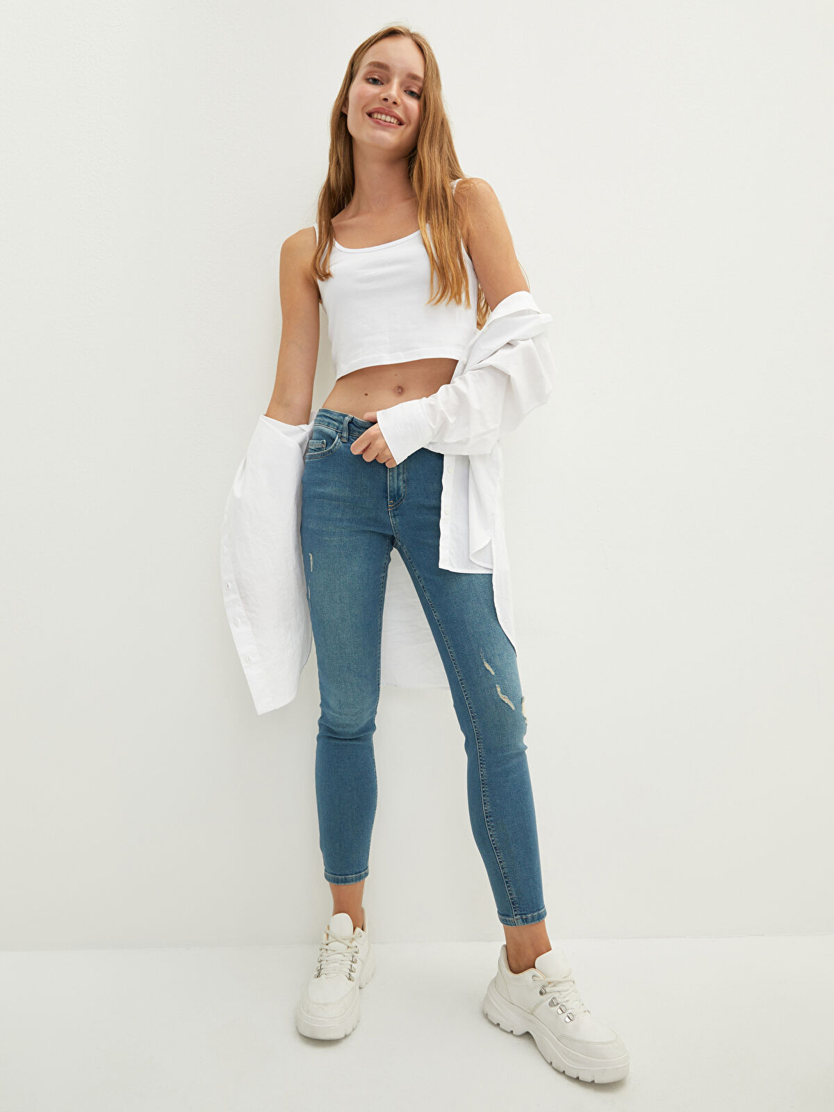 Normal Bel Skinny Fit Cepli Yırtık Detaylı Kadın Rodeo Jean Pantolon Normal Bel Skinny Fit Cepli Yırtık Detaylı Kadın Rodeo Jean Pantolon