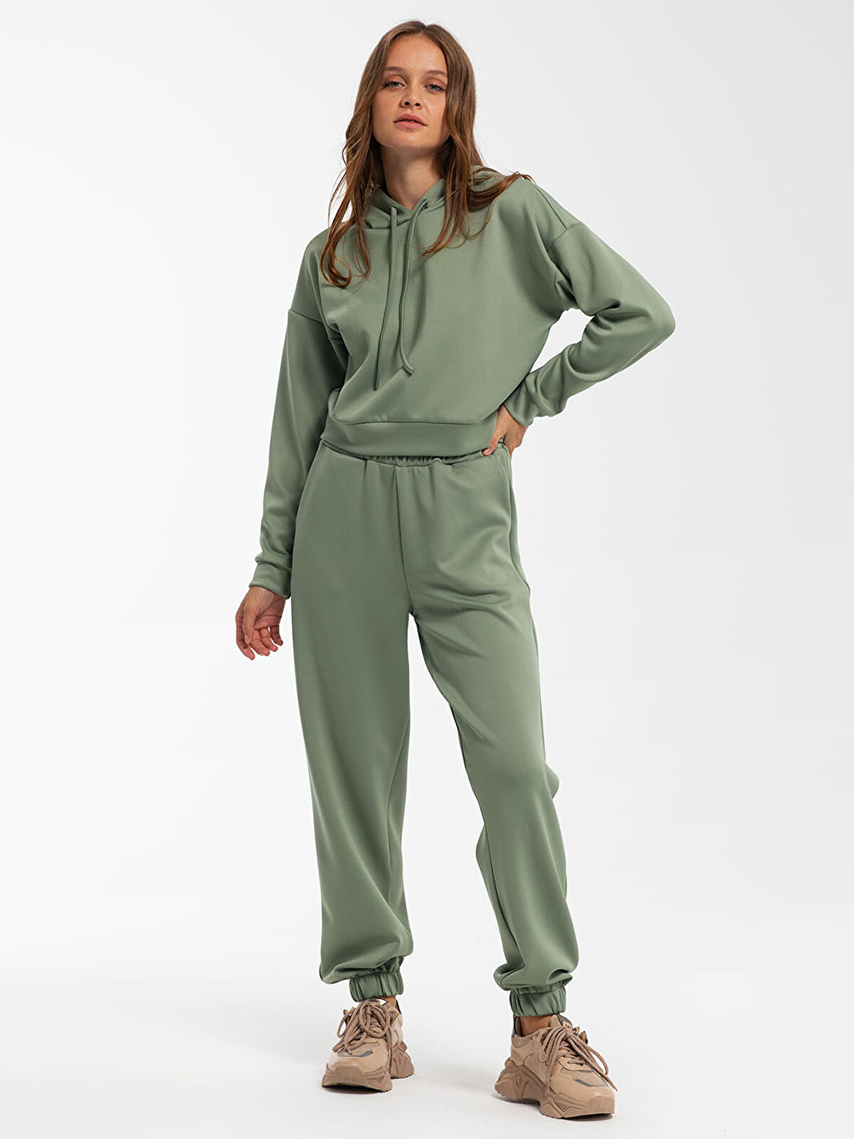 Nisan Triko Beli Lastikli Düz Cep Detaylı Kadın Jogger Eşofman Altı Nisan Triko Beli Lastikli Düz Cep Detaylı Kadın Jogger Eşofman Altı