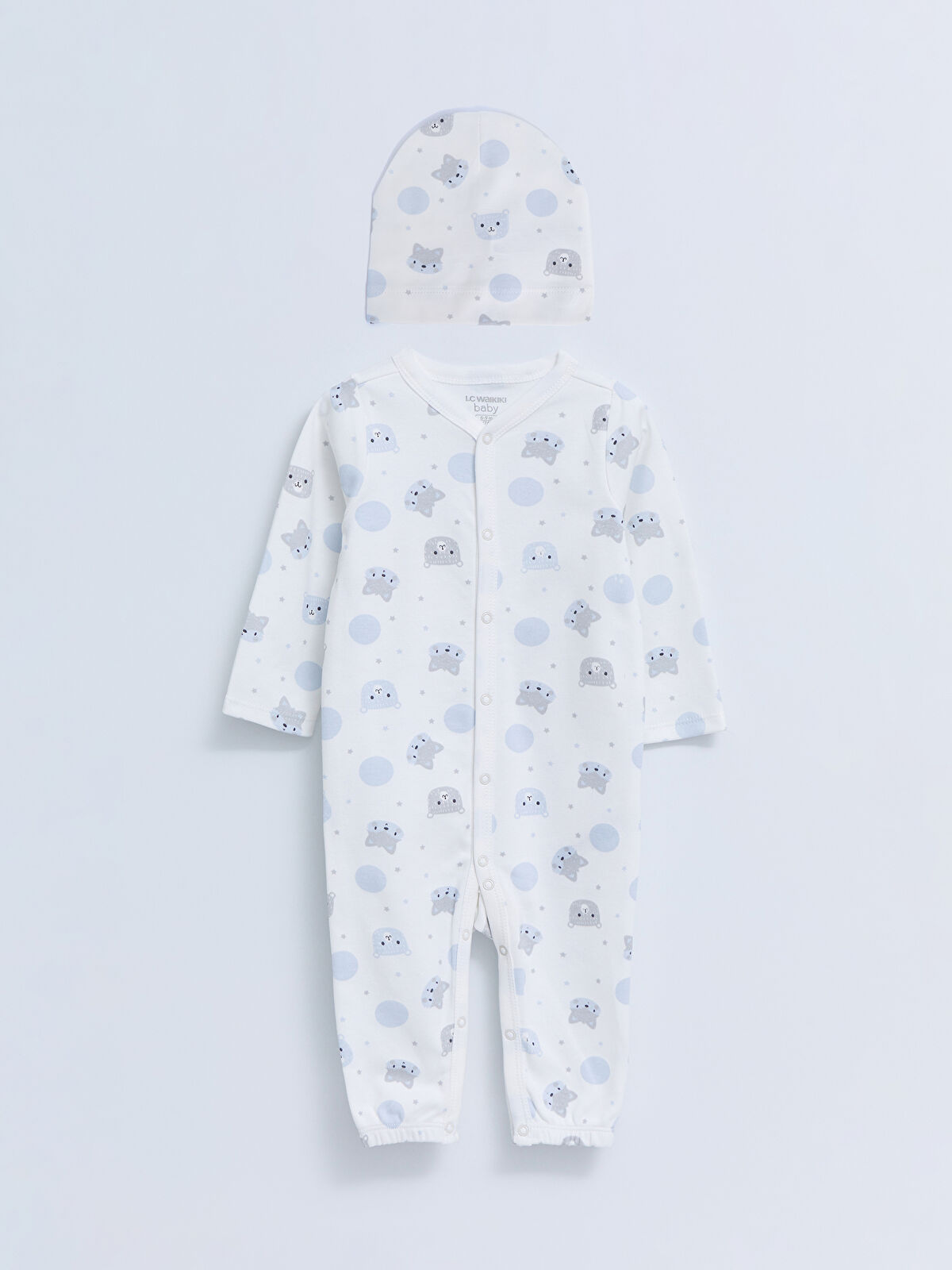 V Yaka Uzun Kollu Baskılı Pamuklu Erkek Bebek Tulum ve Bere 2'li Takım